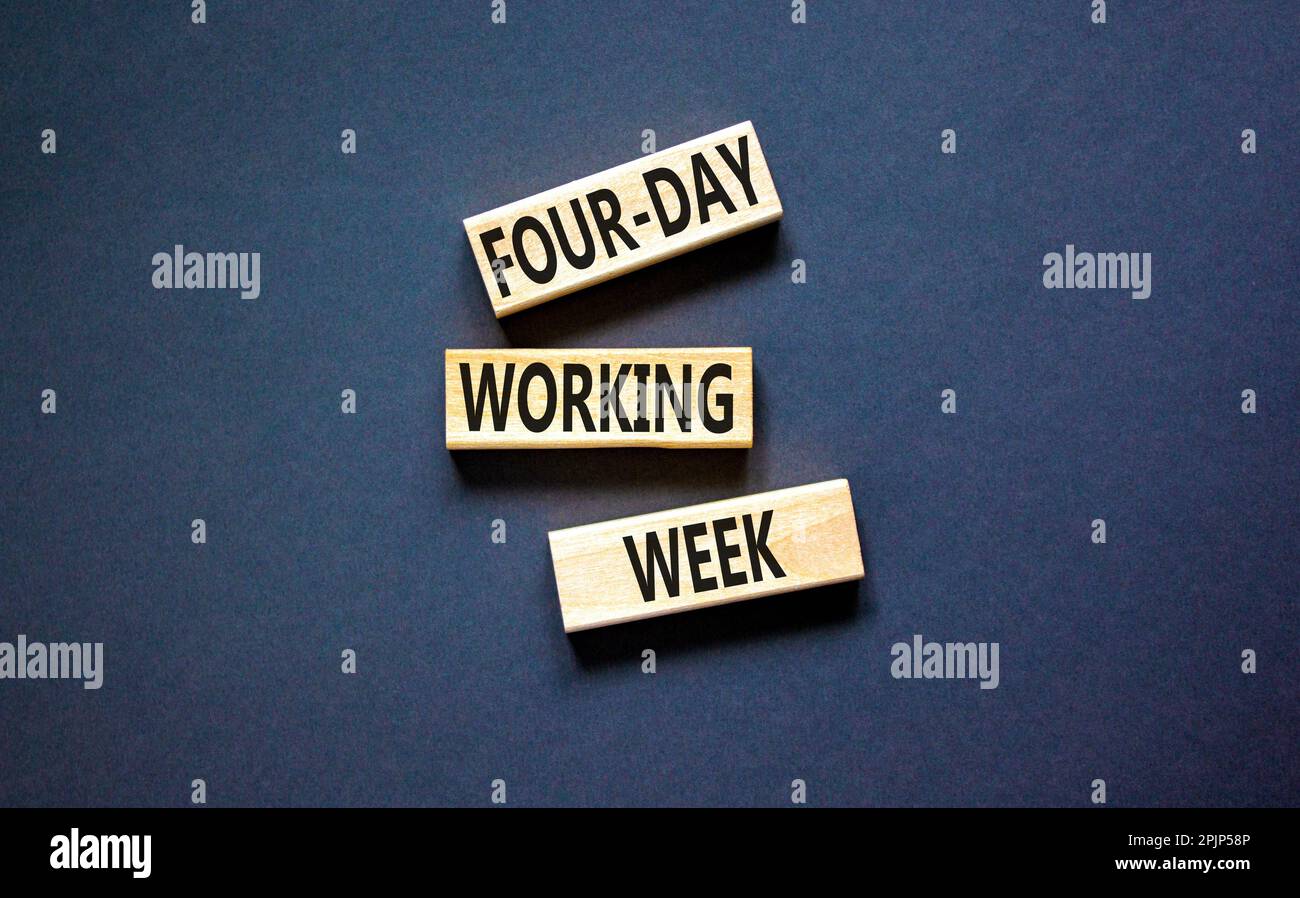 Four-day working week symbol. Concept words Four-day working week on wooden block on a beautiful ...