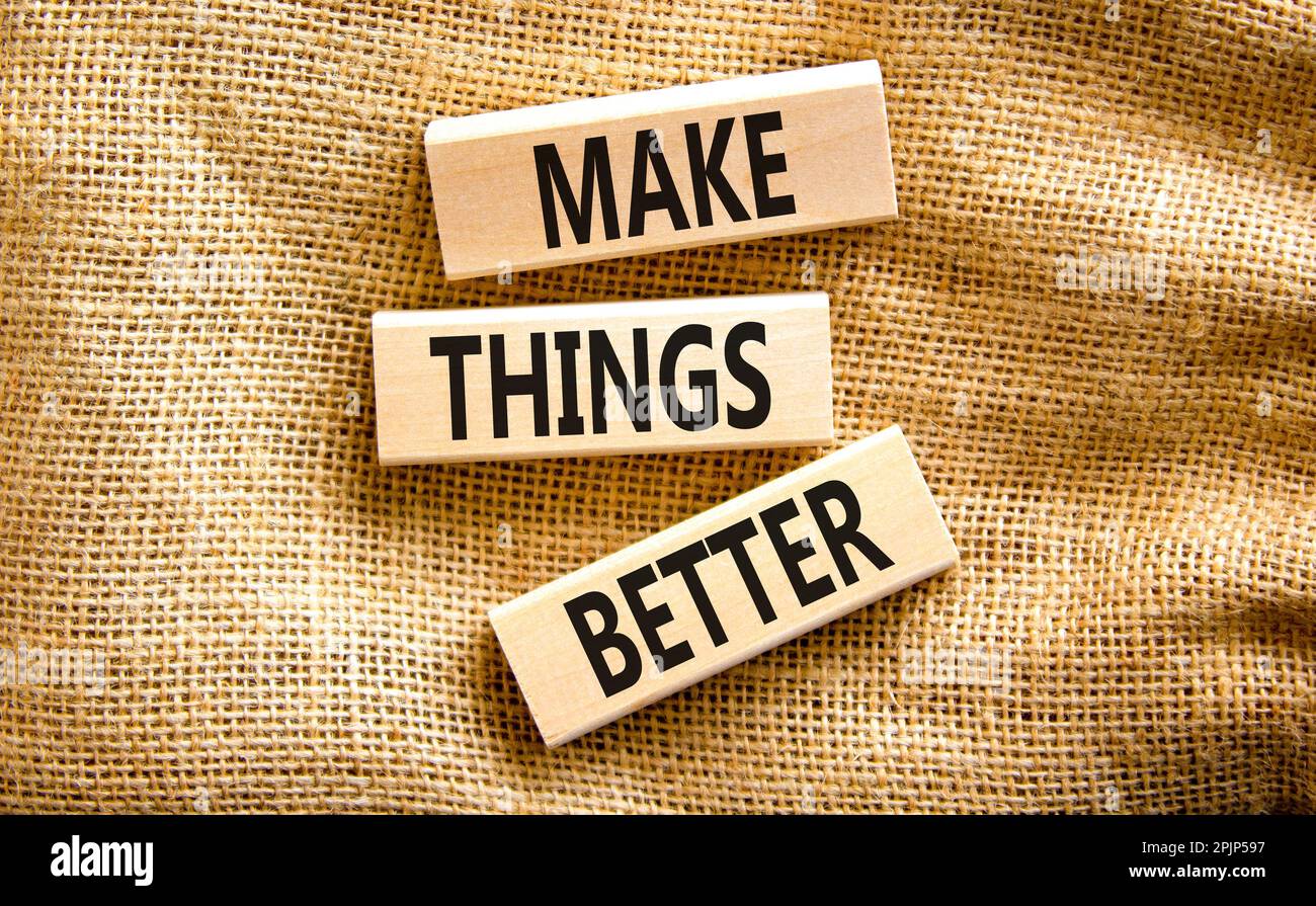 Make things better symbol. Concept words Make things better on wooden ...