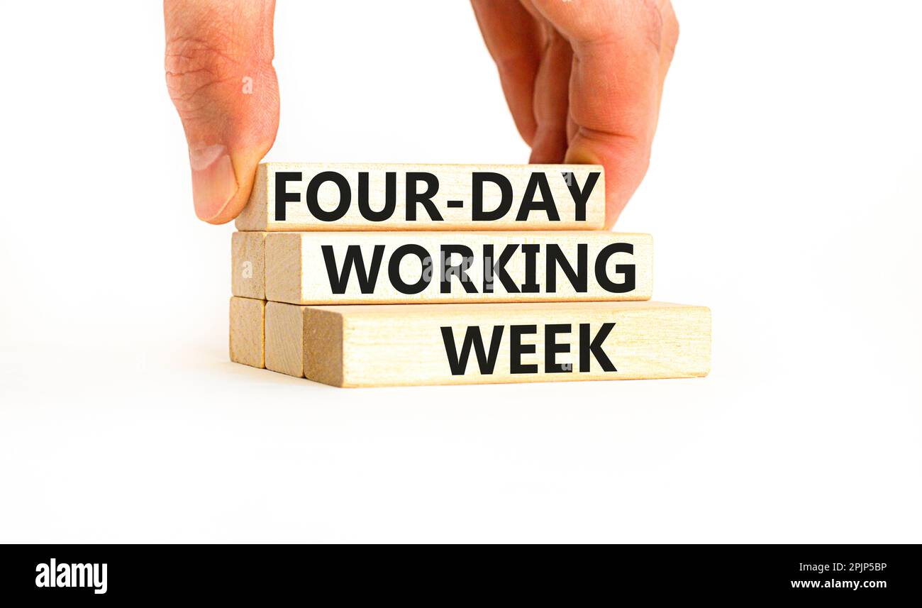 Four-day working week symbol. Concept words Four-day working week on wooden block on a beautiful ...