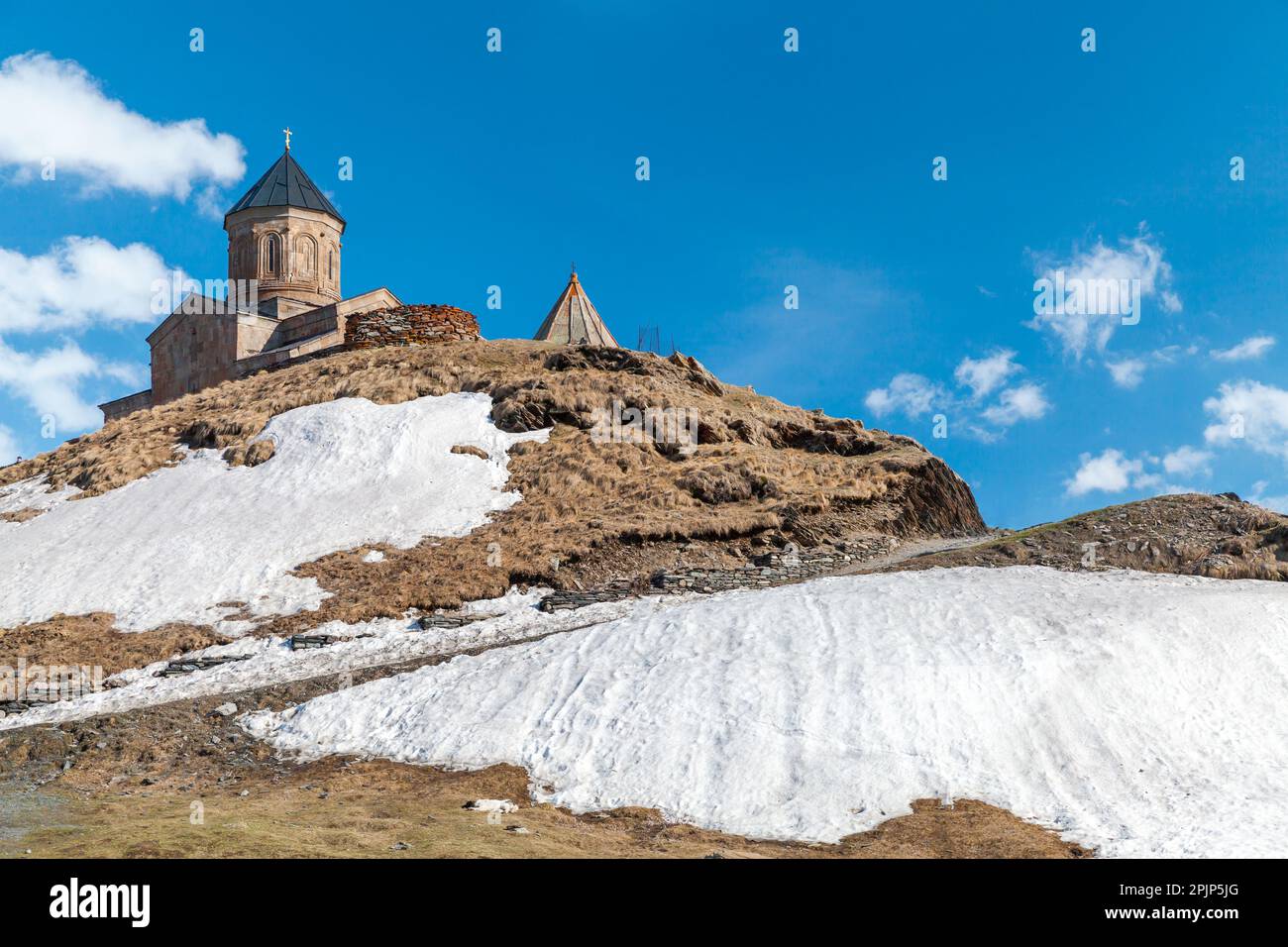 Landscape with Gergeti Trinity Church or Holy Trinity Church near the ...