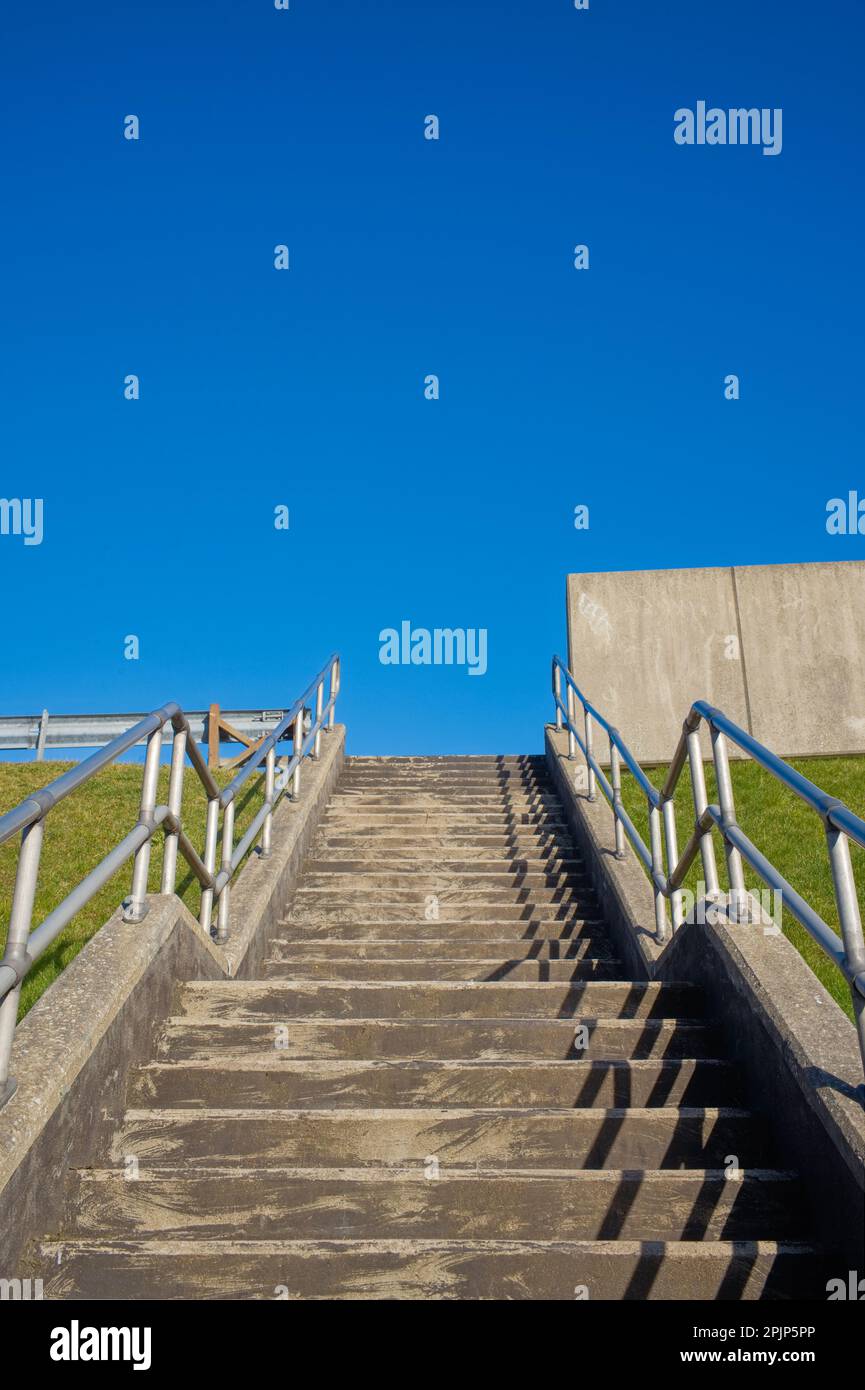 Concrete steps leading up to blue sky Stock Photo - Alamy