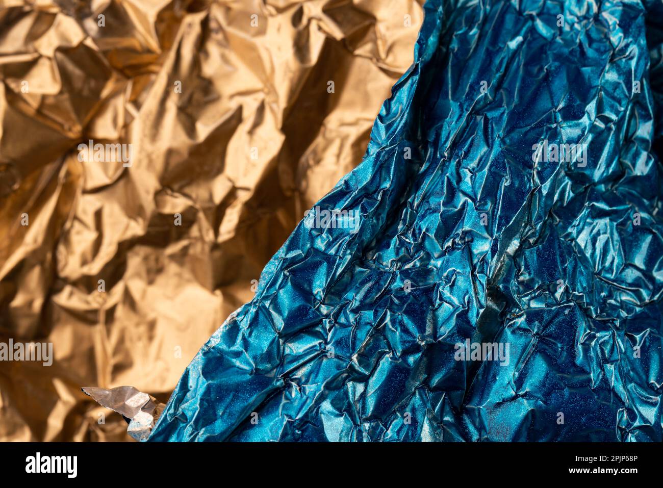 Shiny golden blue foil hi-res stock photography and images - Alamy