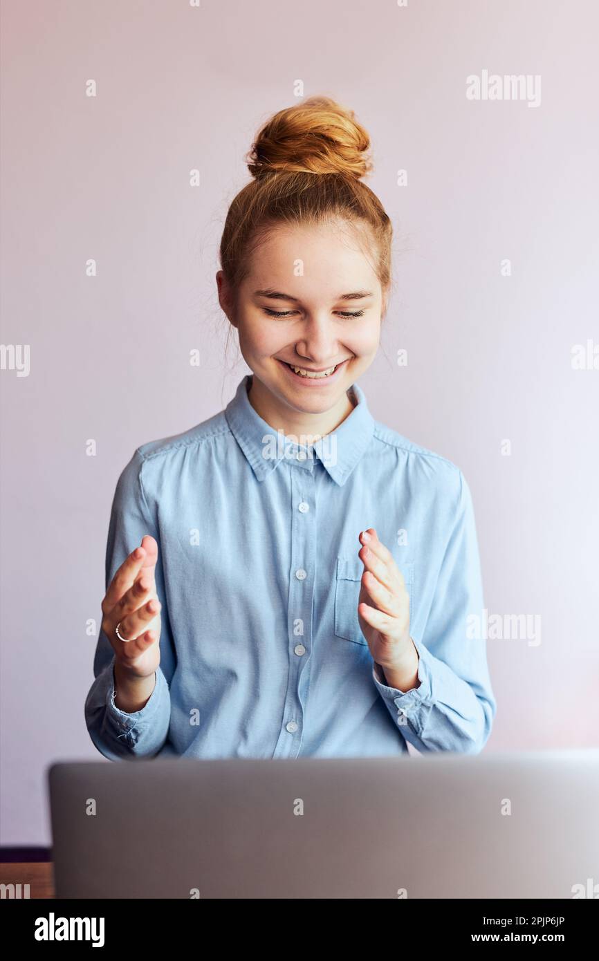 Young woman student having classes, learning online, watching lesson ...