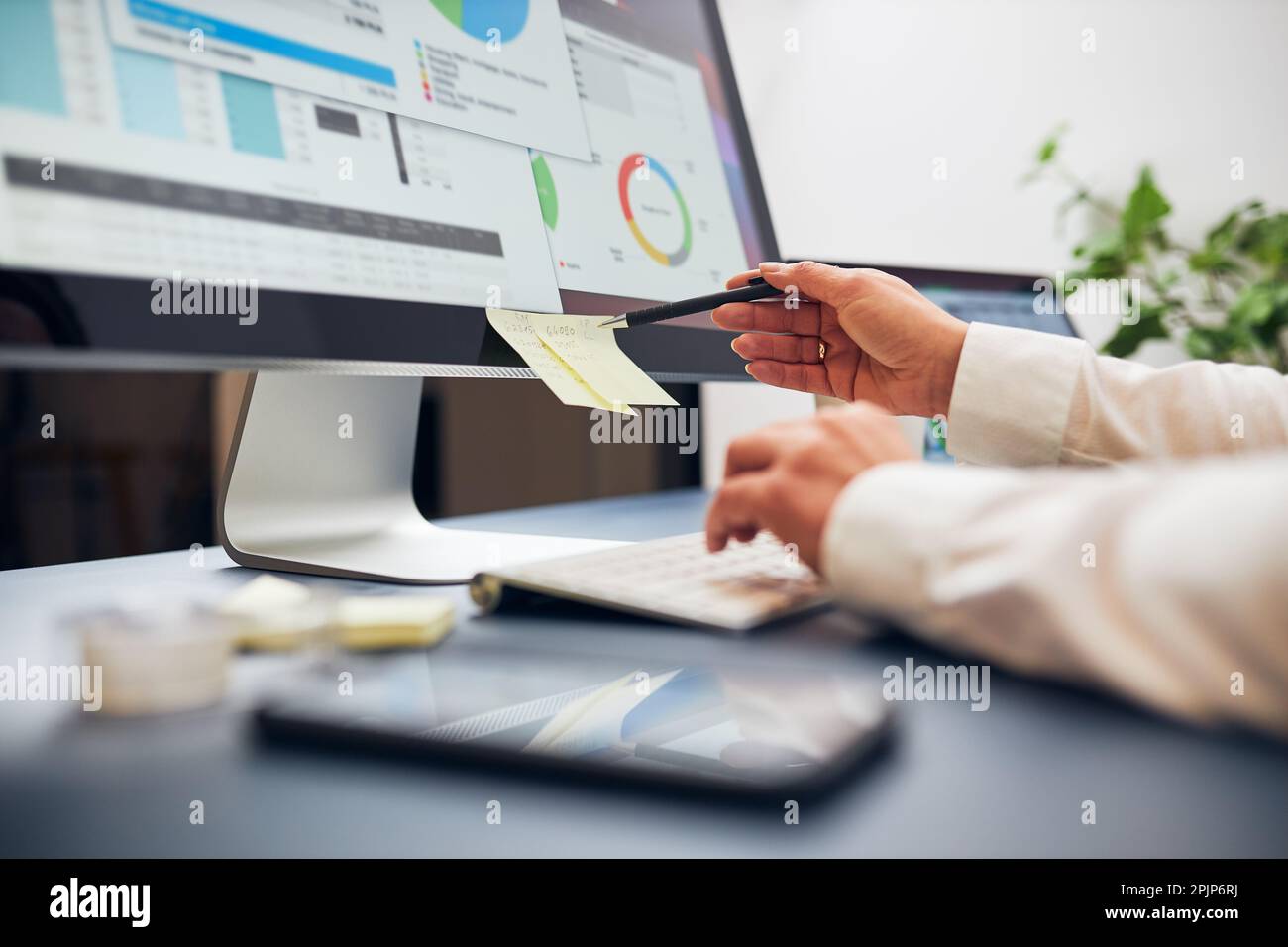 Woman entrepreneur working with data on charts, graphs and diagrams on ...