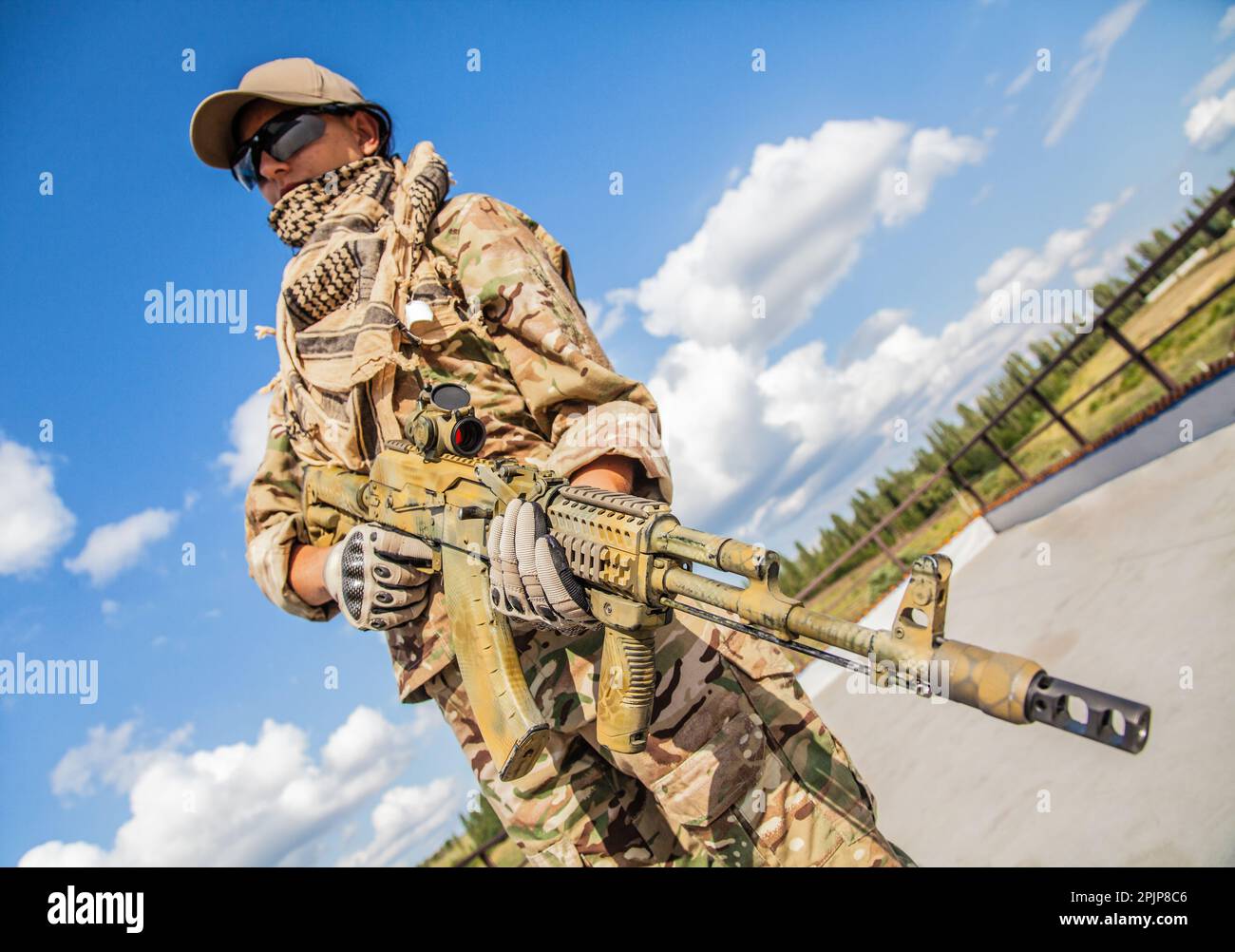 Girl with an assault rifle, strong determined, and capable woman ...