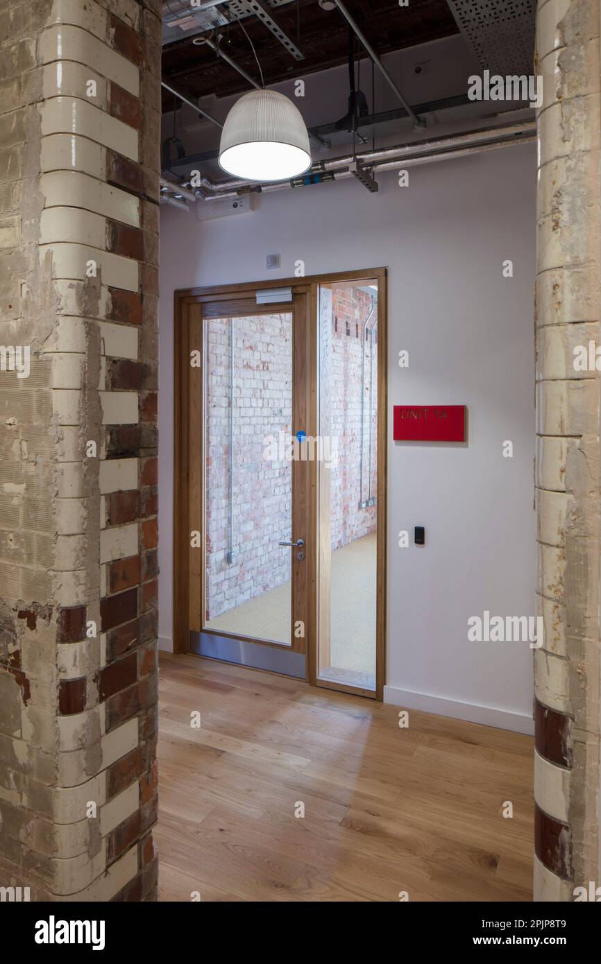 Upper level corridor with the historical building materials visible ...