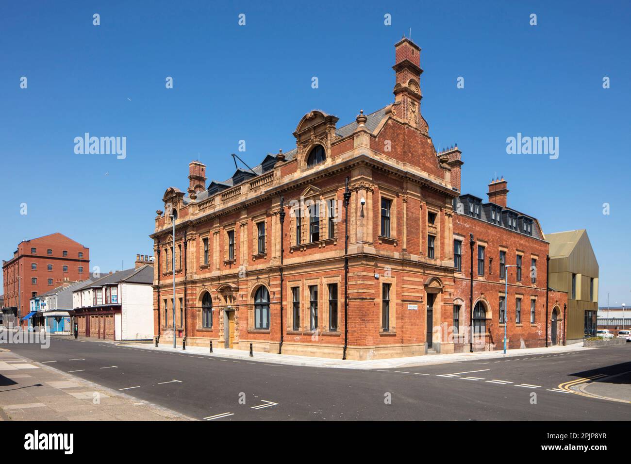 Wide view of the historical post office frontage, with the new additions visible to the rear ...