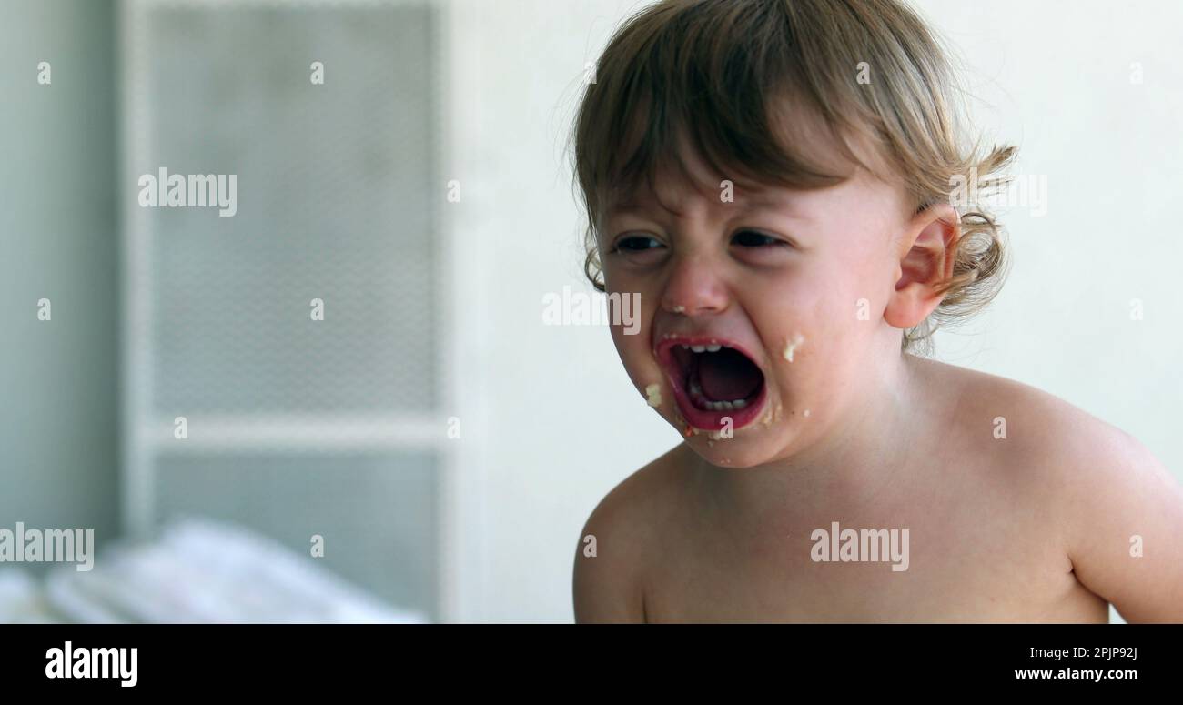 Baby boy crying, hurt infant child cries Stock Photo - Alamy