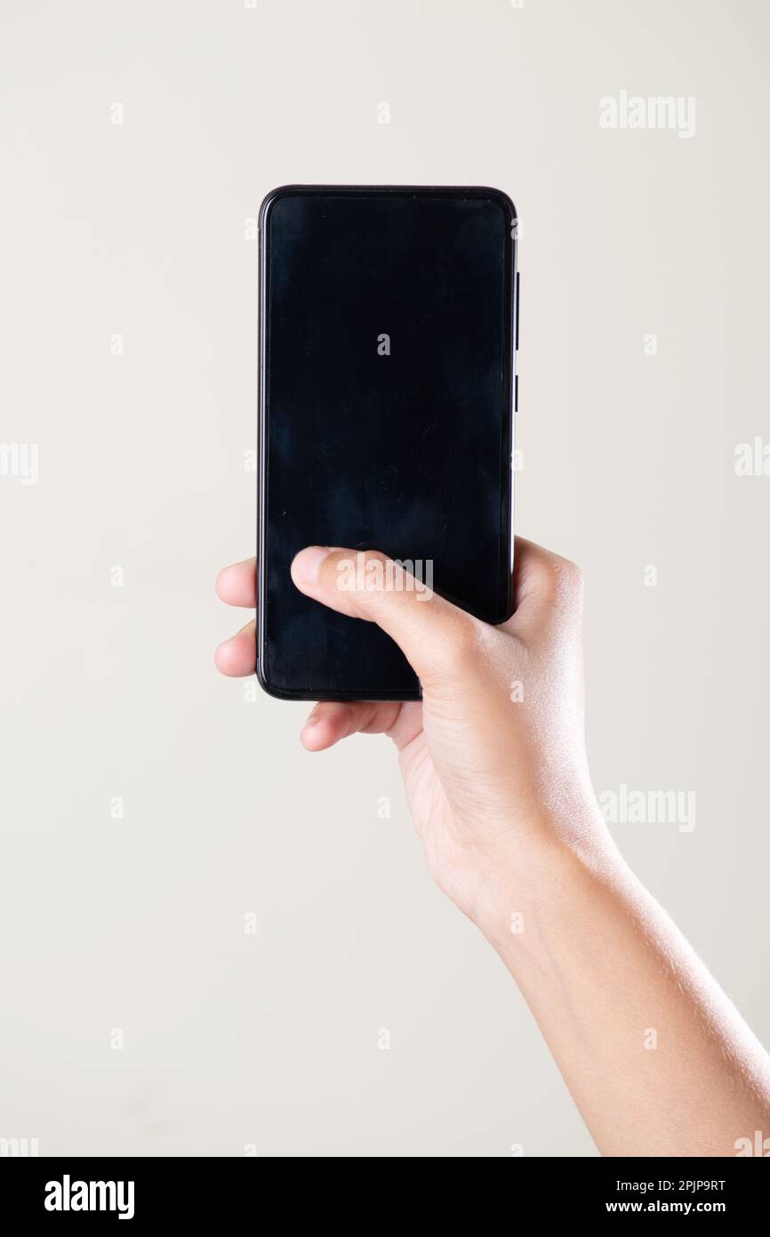 Phone in hand grey hi-res stock photography and images - Alamy