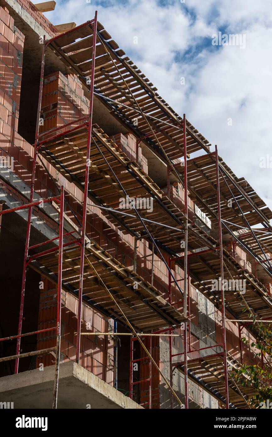Construction site with building and scaffolding, close up Stock Photo ...