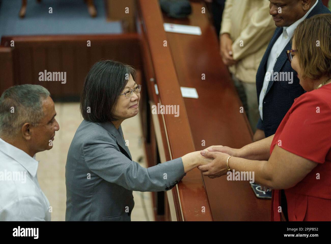Taiwan's President Tsai Ing-wen, center, shakes hands with a Senator at ...