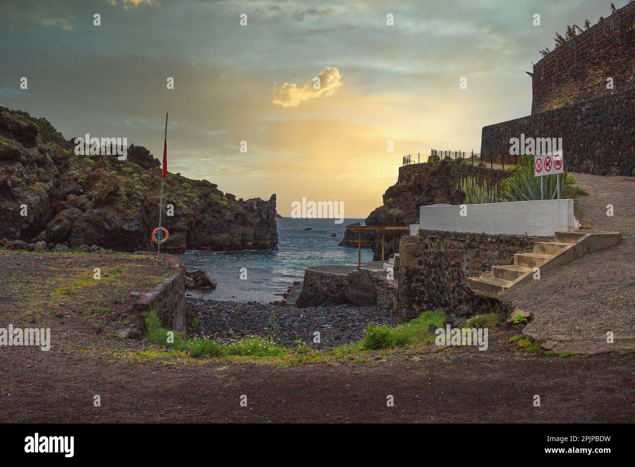A picturesque beach town with a traditional design is illuminated by ...