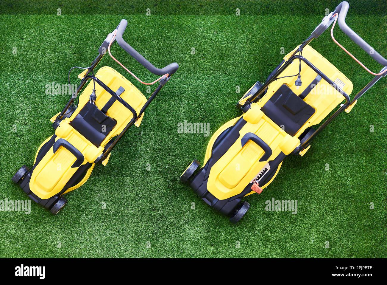Yellow mower grass garden hi-res stock photography and images - Alamy