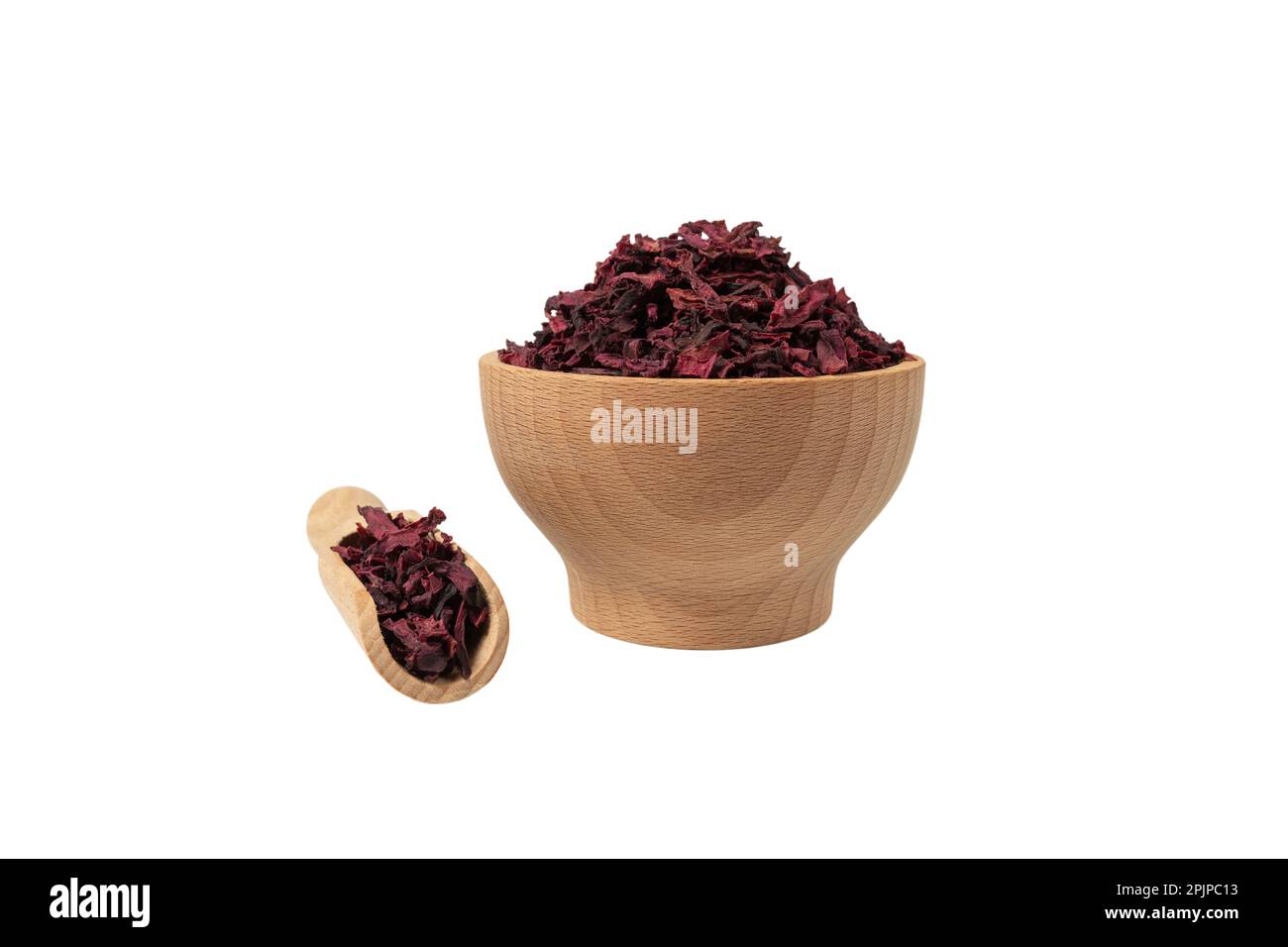 Dried beetroot slices in wooden bowl and scoop isolated on white ...