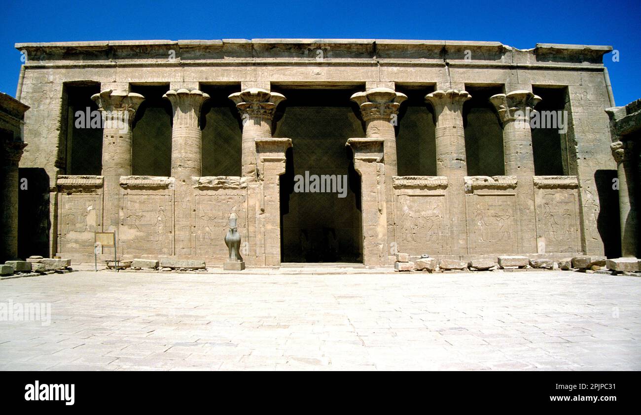Main entrance to the Temple of Edfu in Egypt with the statue of Horus ...