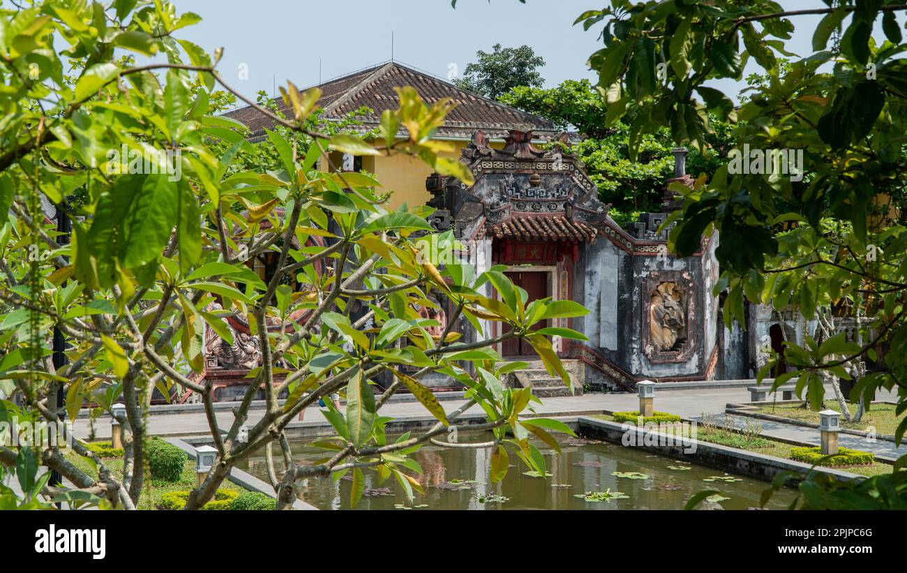 Temple in greenery and trees asia Stock Photo - Alamy