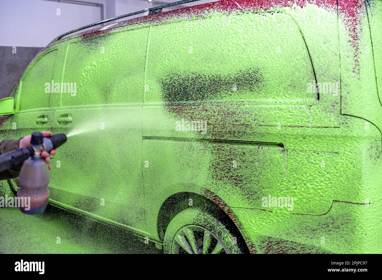 wash cars with green active foam in the garage Stock Photo - Alamy