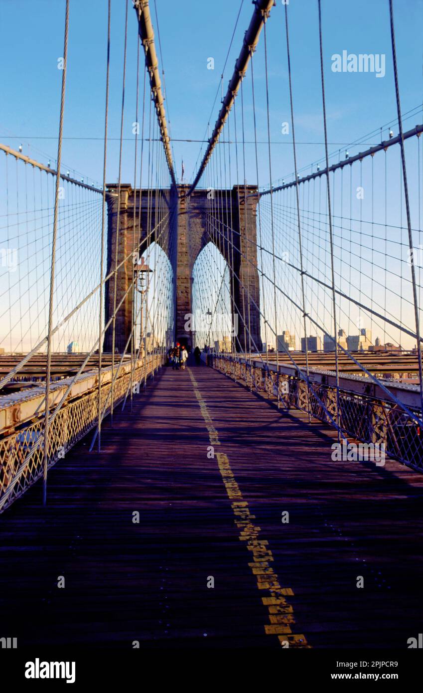 View of the Brooklyn Bridge with the New York City skyline. A hybrid ...