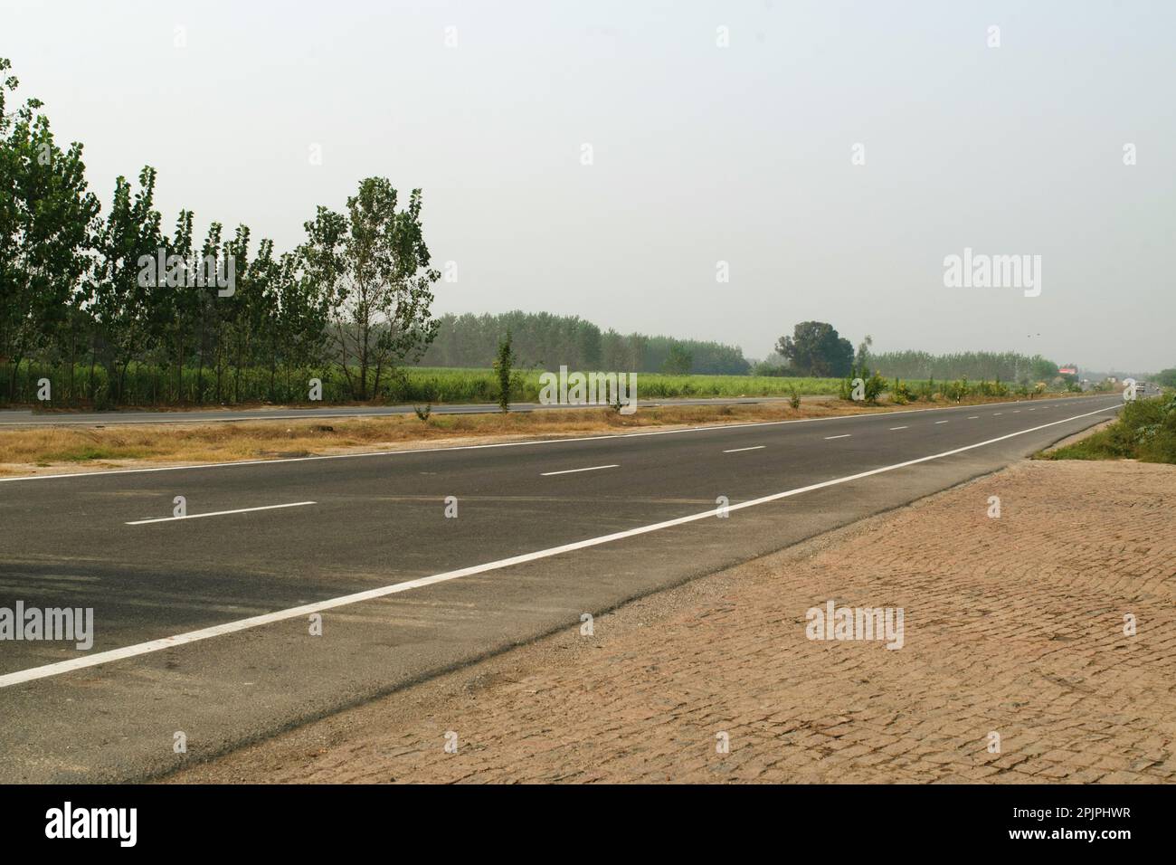Clean and empty highway road at uttar pradesh Stock Photo - Alamy