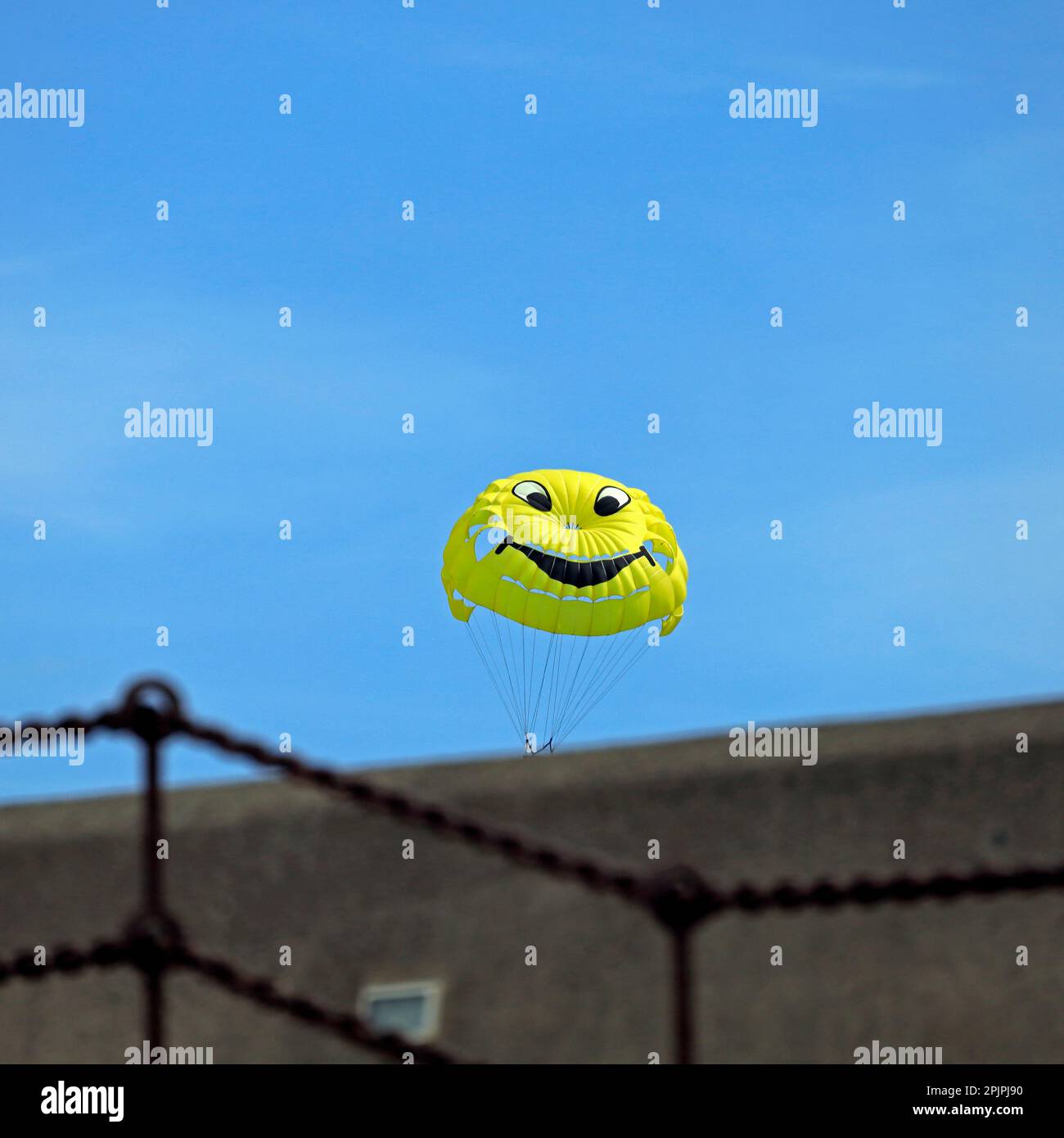 Parasailing. Yellow parachute with a smiley face, Rubicon Marina, Playa ...