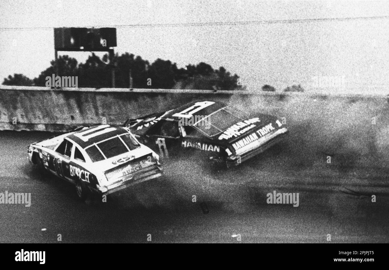 The cars of Donnie Allison (1) and Cale Yarborough (11) collide at turn ...