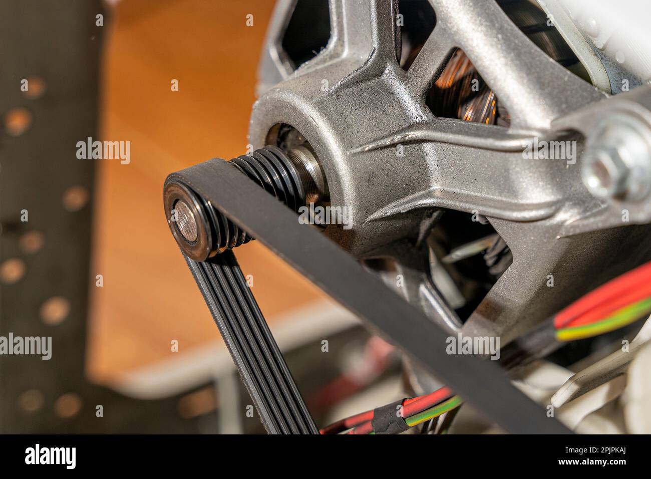 Electric motor and belt drive of an electric washing machine Stock ...