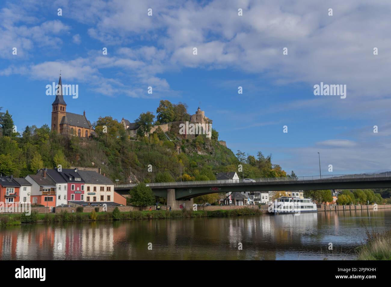 City view of the german city Saarburg with river called Saar and old castle ruin Stock Photo - Alamy
