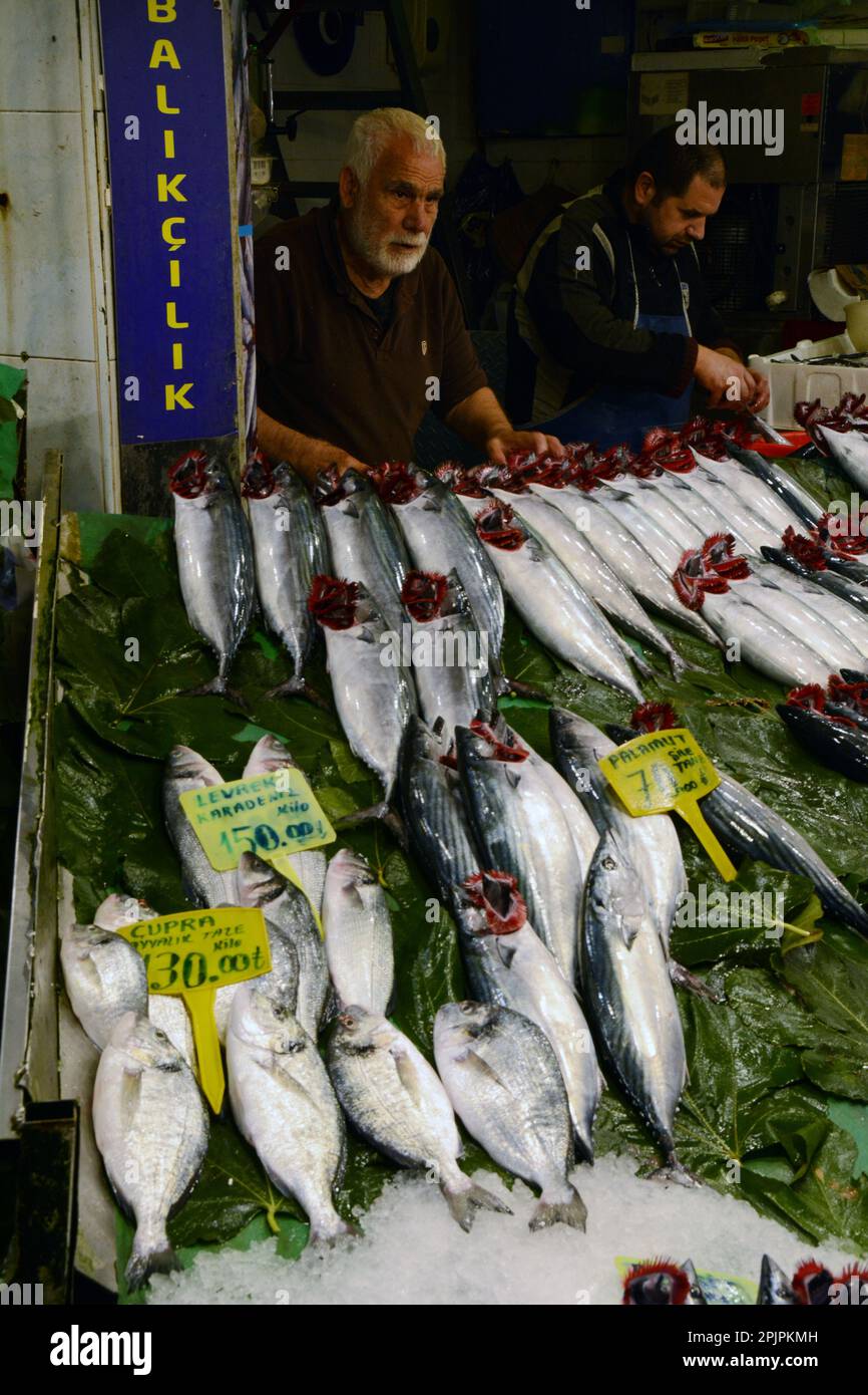 Whole fresh fish and seafood for sale amid fishmongers at the Galata ...