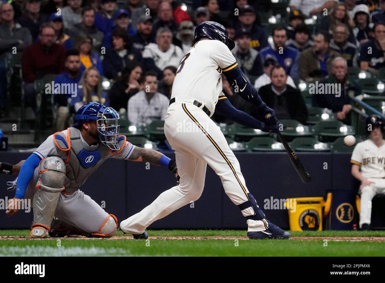 Milwaukee Brewers' Jesse Winker hits an RBI single during the third ...