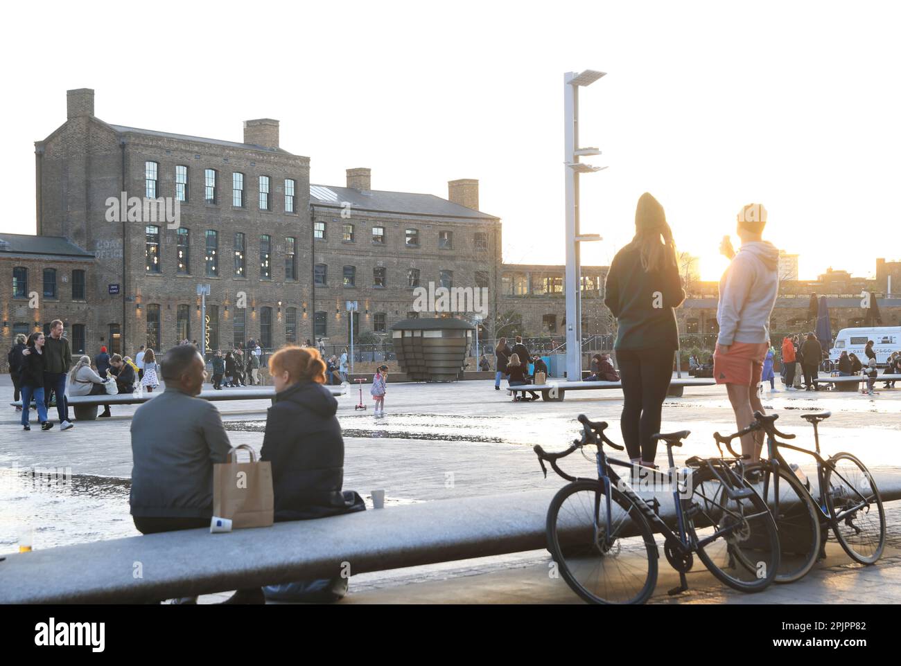 Winter sunset on Granary Square at Kings Cross, London, UK Stock Photo ...