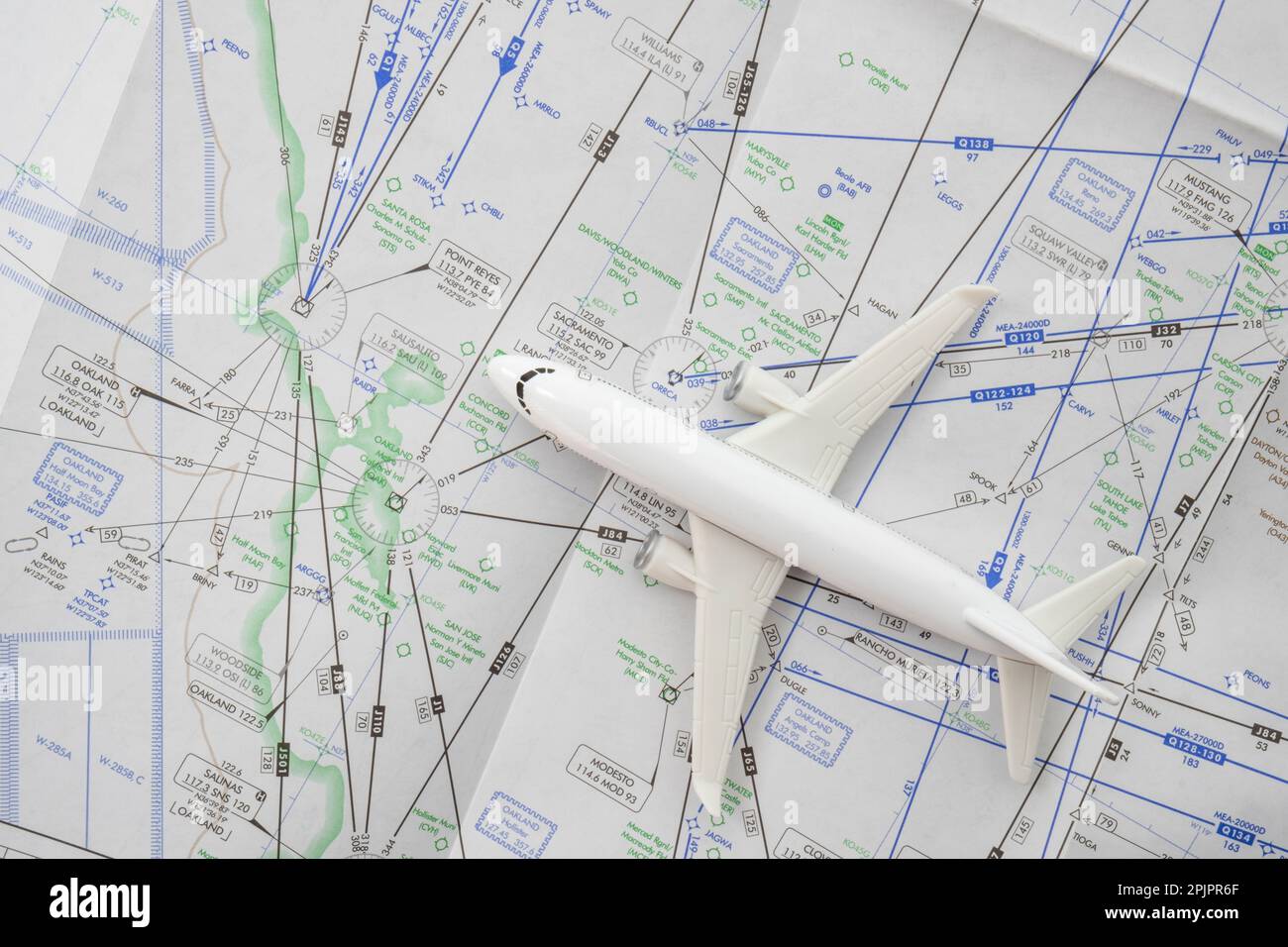 Close up of a miniature airplane on an FAA aviation sectional ...