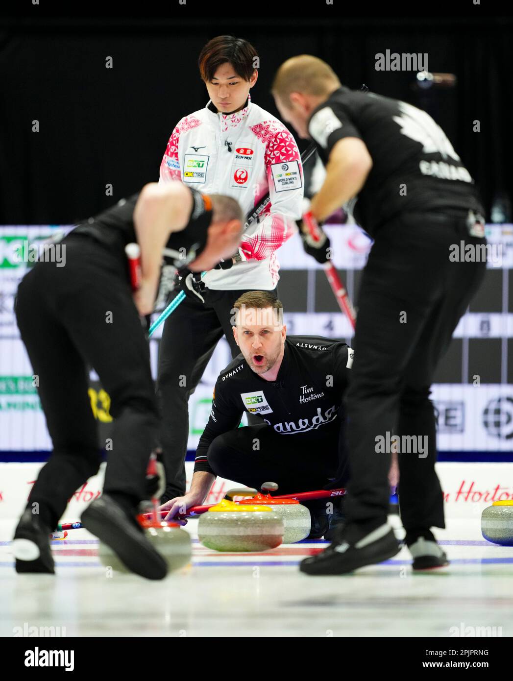 Canadian skip Brad Gushue calls for sweep as Japan skip Riku Yanagisawa ...