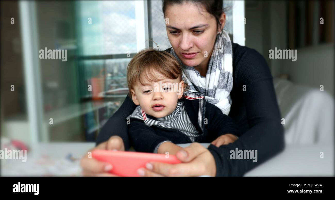 Content mother watching child hi-res stock photography and images - Alamy