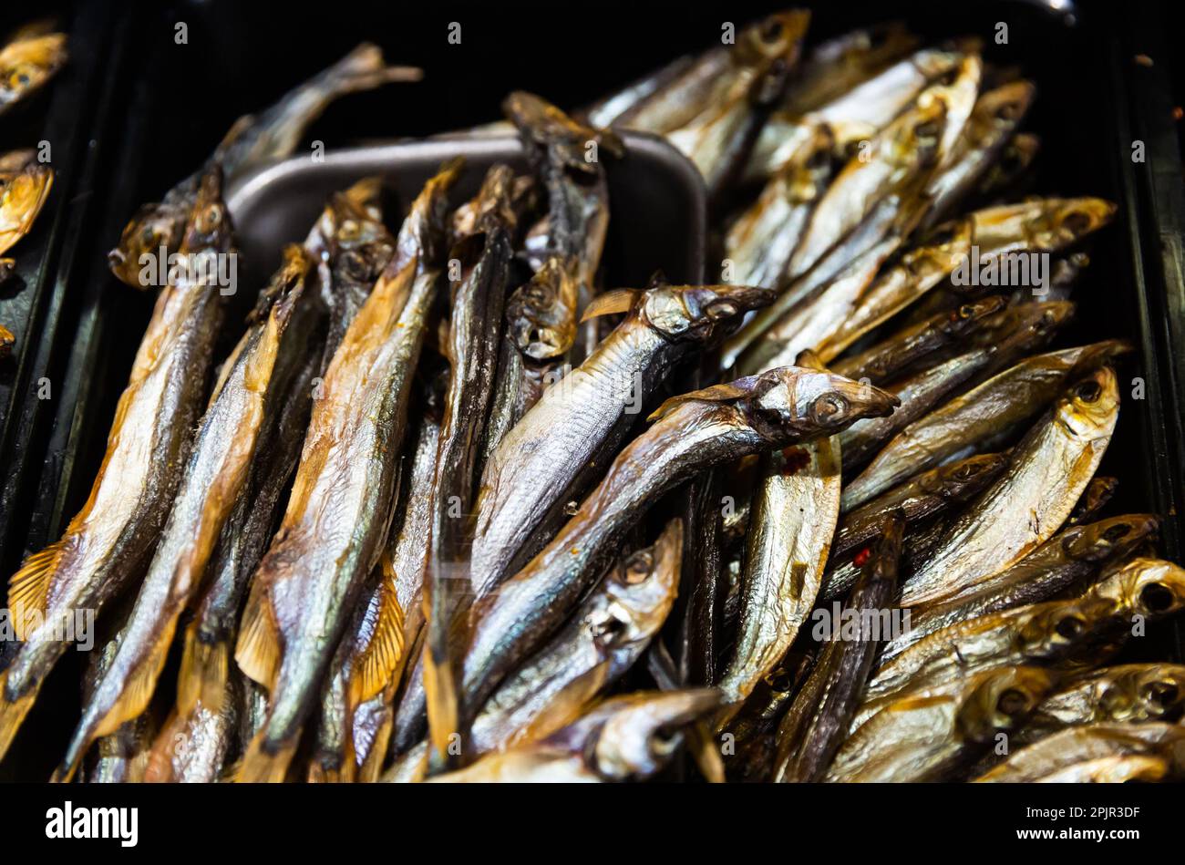 Cold smoked fish on store counter Stock Photo - Alamy