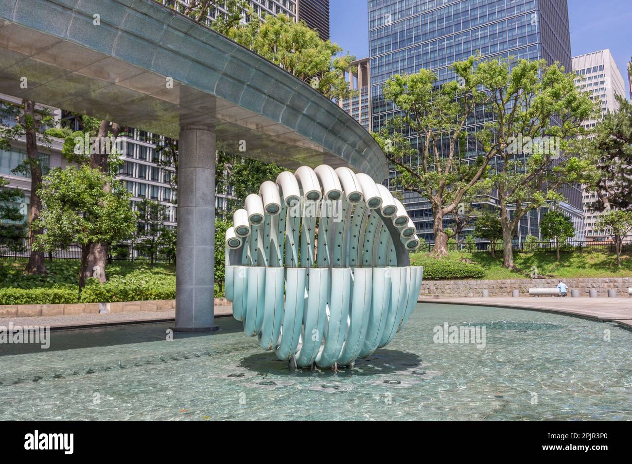 Water fountain sculpture. Public art in Wadakura Fountain Park ...