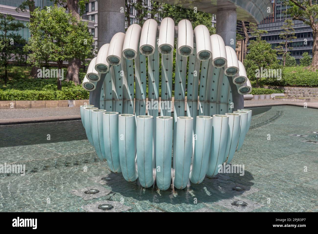 Water fountain sculpture. Public art in Wadakura Fountain Park ...