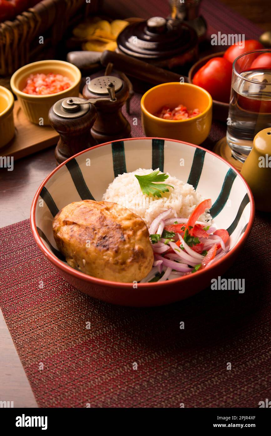 Papa rellena stuffed potato Peruvian food buffet table Assorted dishes ...