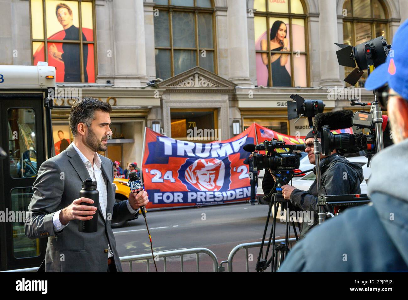 New York, USA. 3rd Apr, 2023. A fox news reporters works in front of a ...