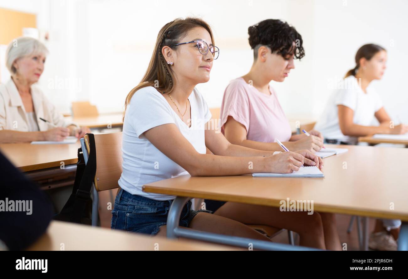 Group people attending language hi-res stock photography and images - Alamy