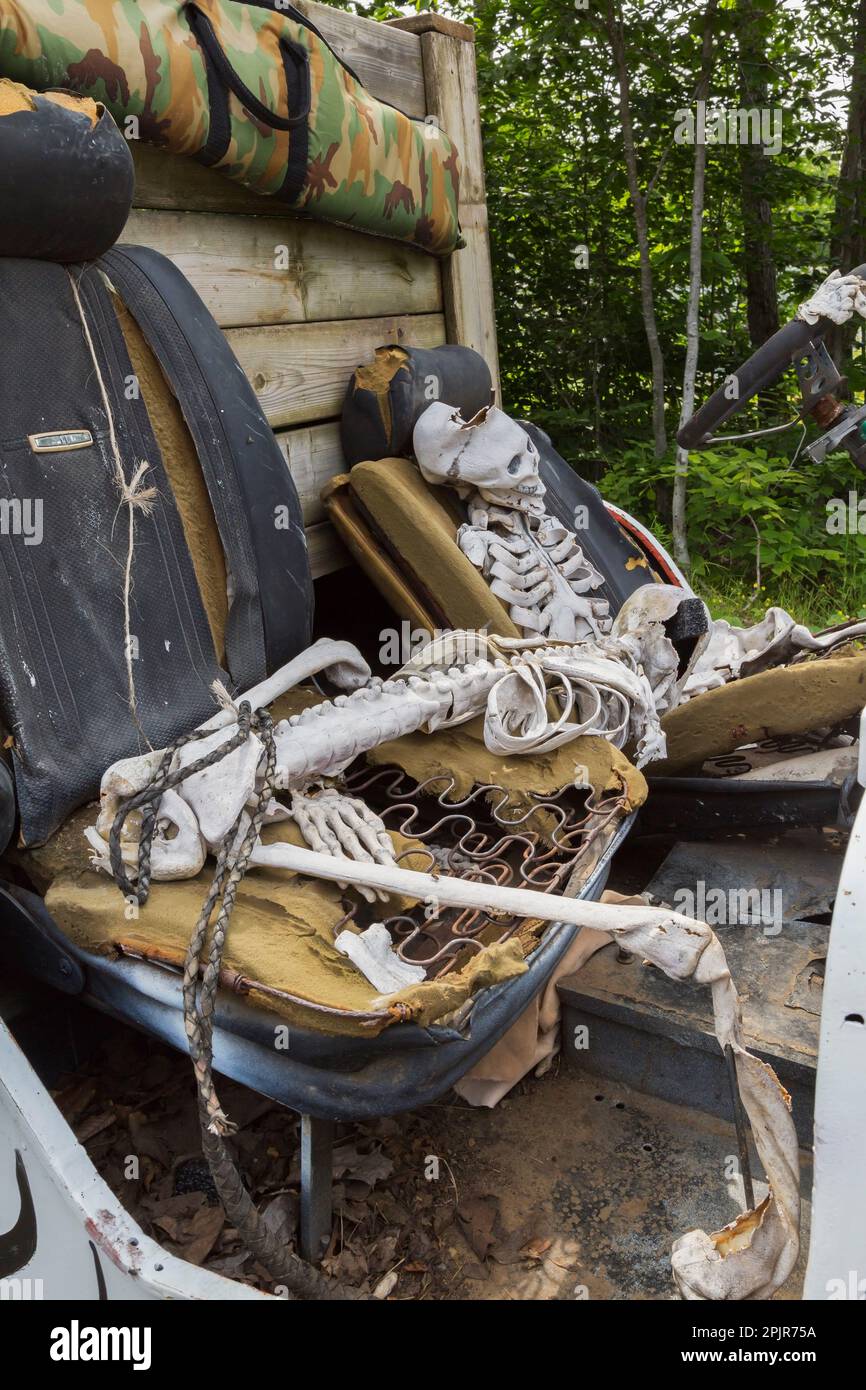 Staged scene of lost and deceased adventurer's skeleton in broken down ...
