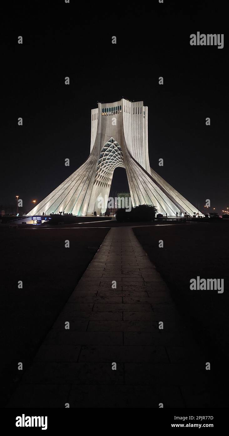 The historic Azadi Tower in Baghdad, Iraq, illuminated against the ...
