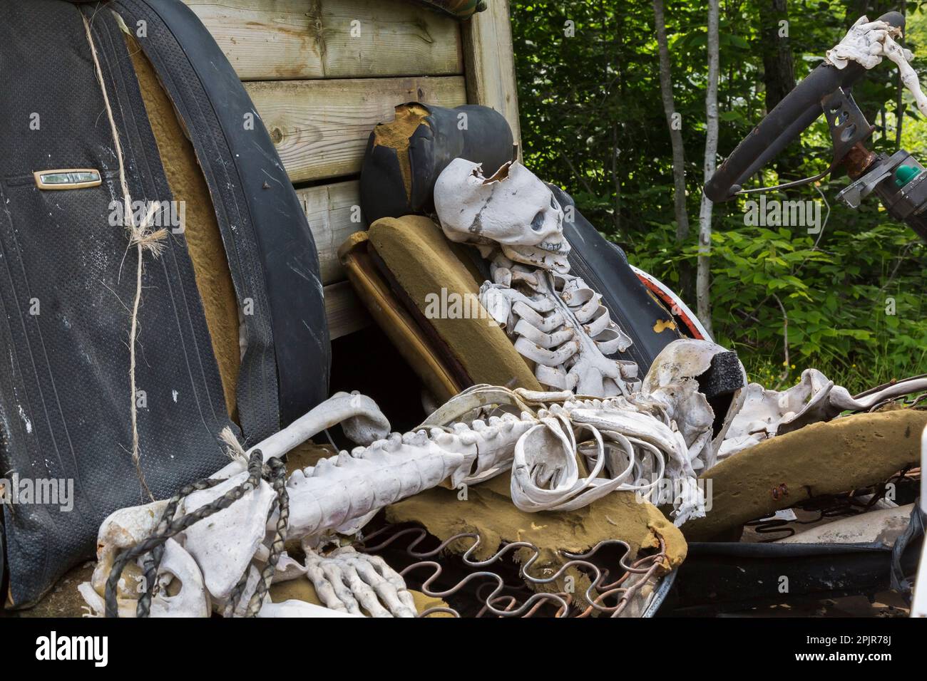 Staged scene of lost and deceased adventurer's skeleton in broken down ...