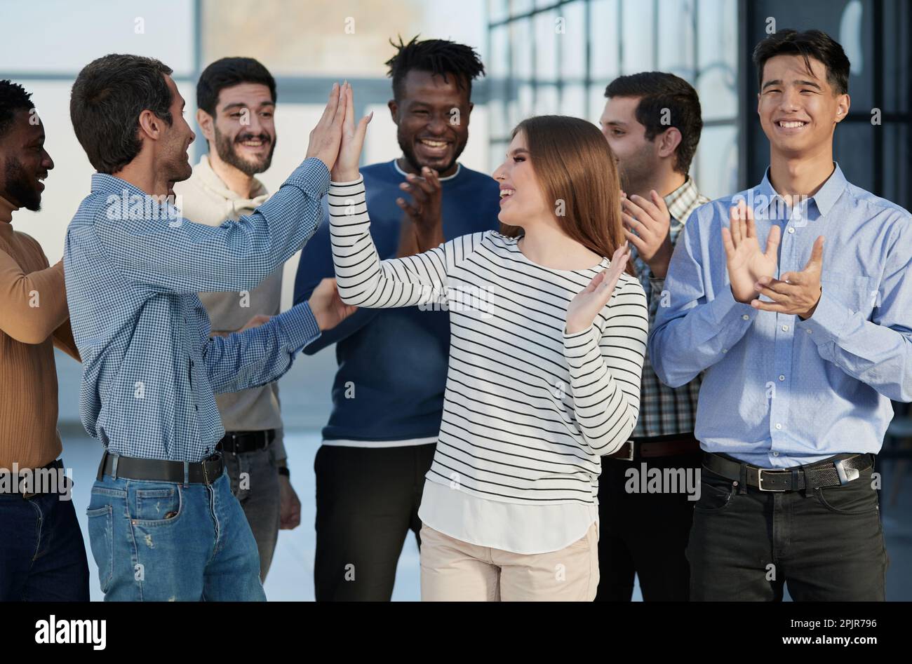 Happy employees clapping boss hi-res stock photography and images - Alamy