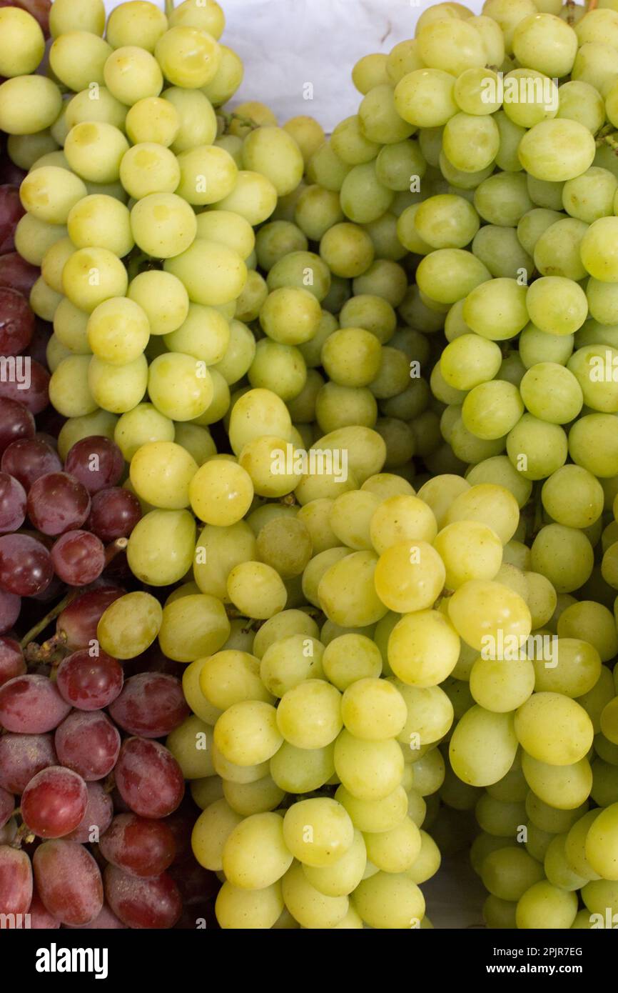Green and purple grapes Fruits and vegetables from Peru Stock Photo - Alamy