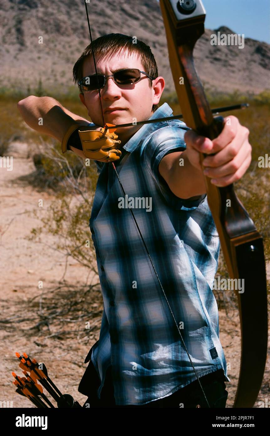 Man shooting recurve bow hi-res stock photography and images - Alamy