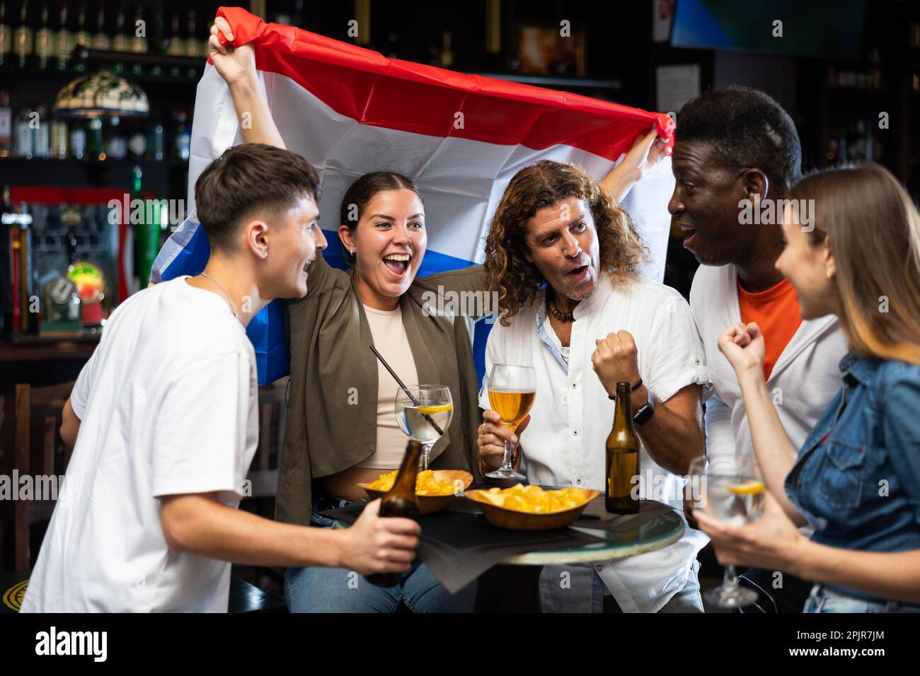 Netherlands sports fans supporting their favourite team in pub Stock ...