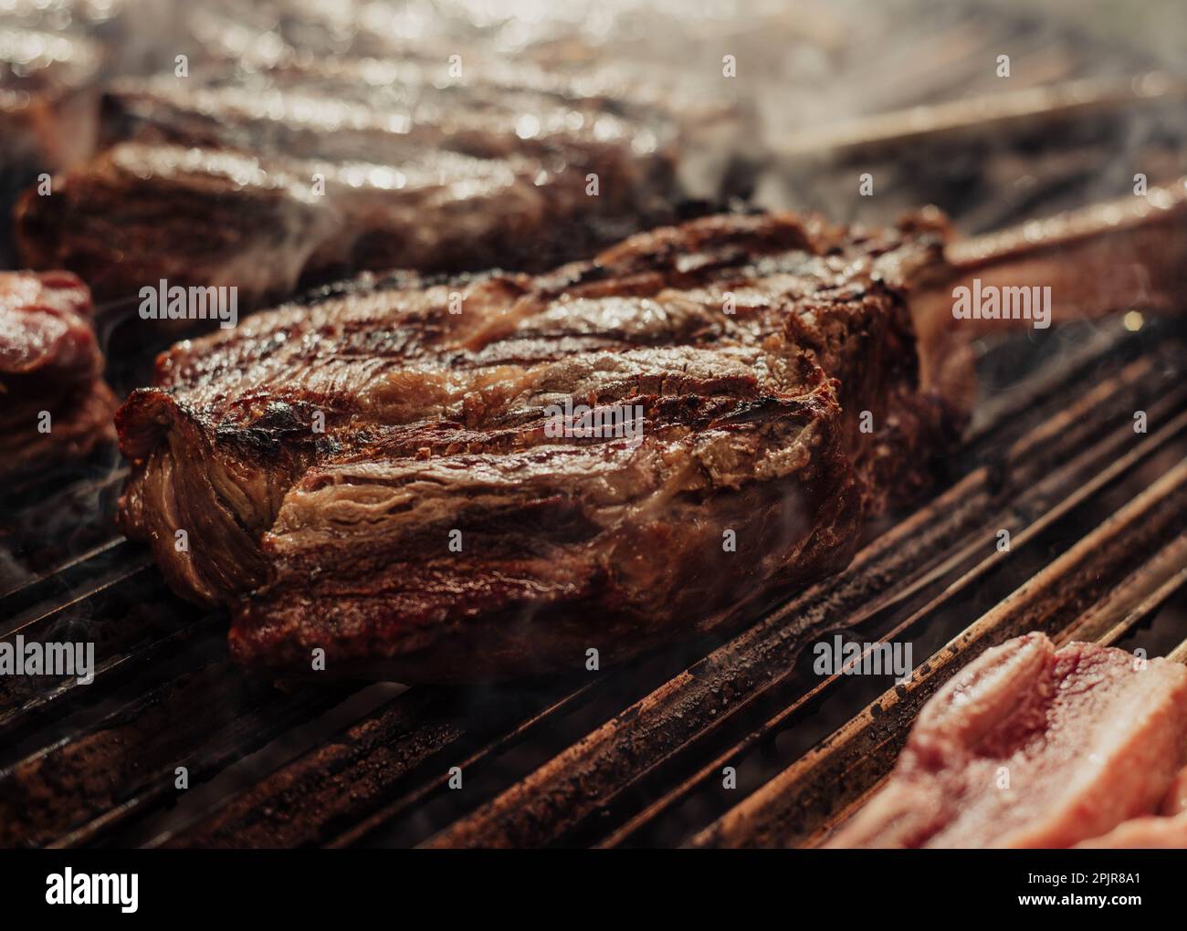Some excellent pieces of Argentinian beef on a charcoal grill Stock ...