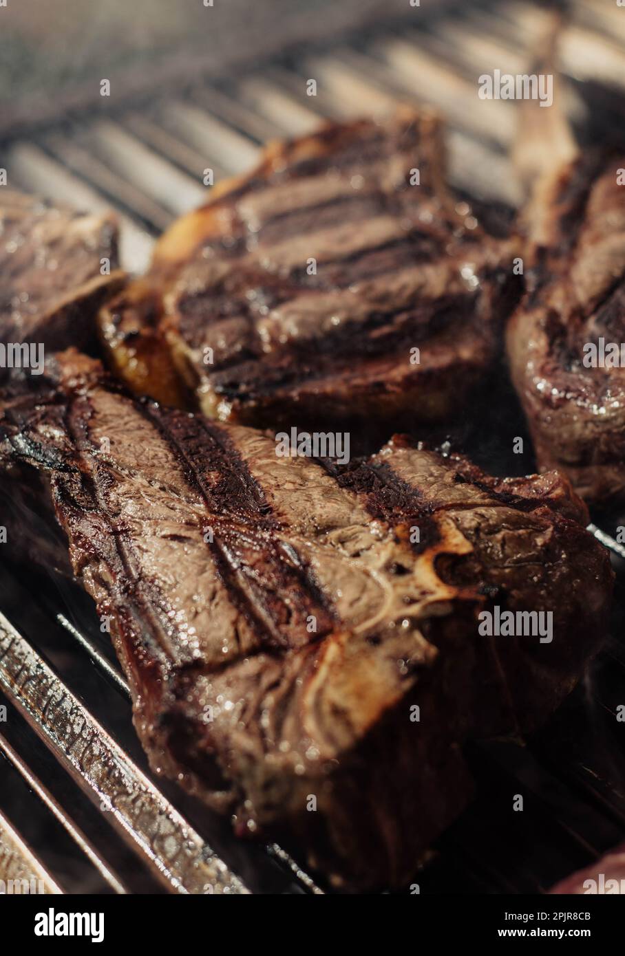Some excellent pieces of Argentinian beef on a charcoal grill Stock ...