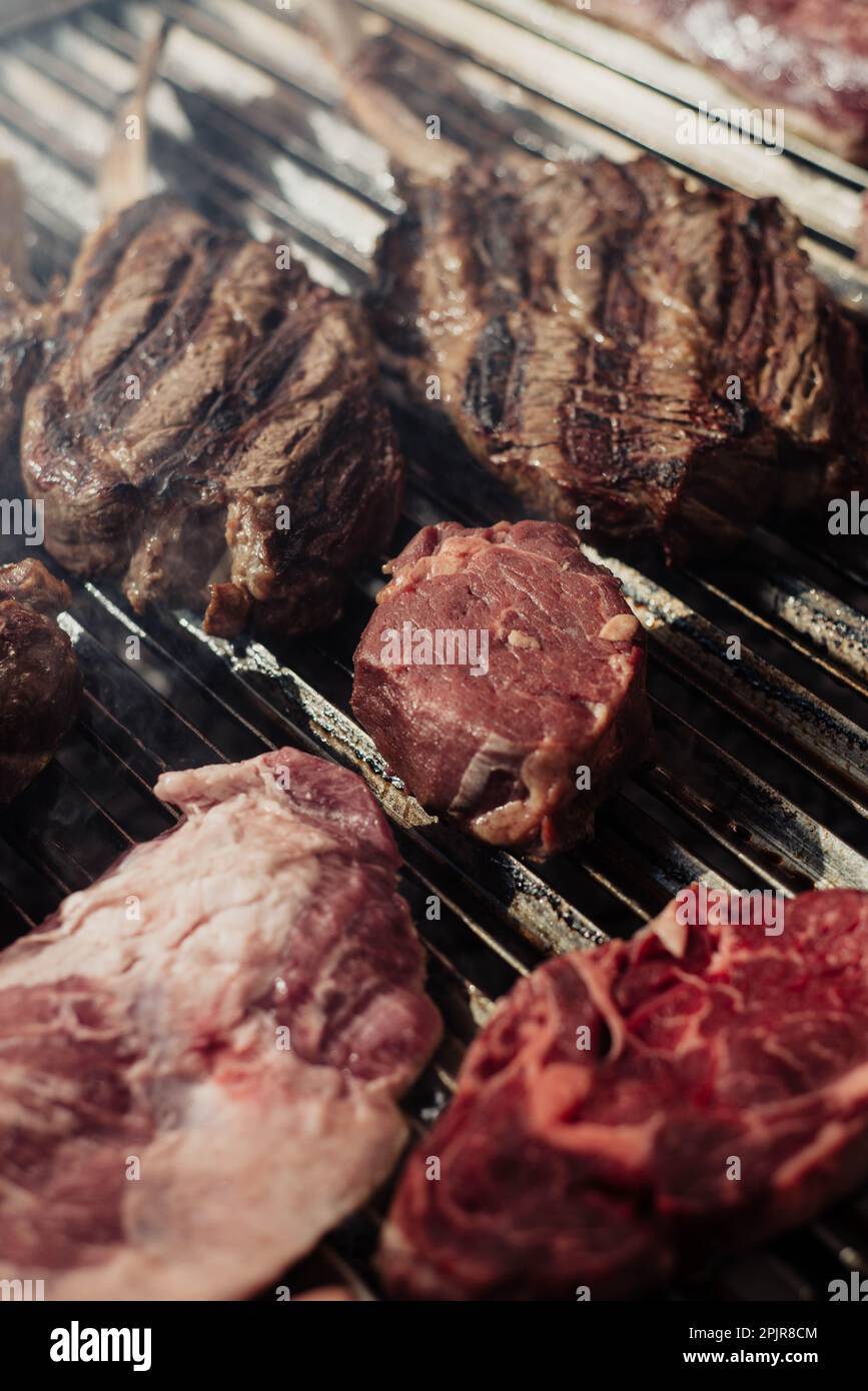 Some excellent pieces of Argentinian beef on a charcoal grill Stock ...