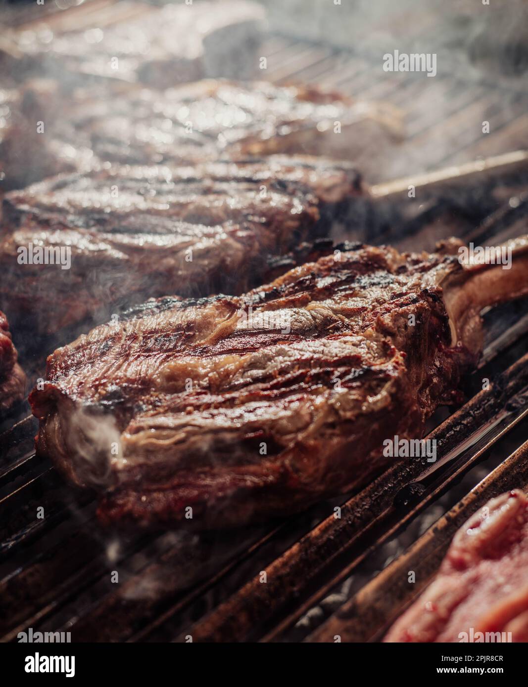 Some excellent pieces of Argentinian beef on a charcoal grill Stock ...